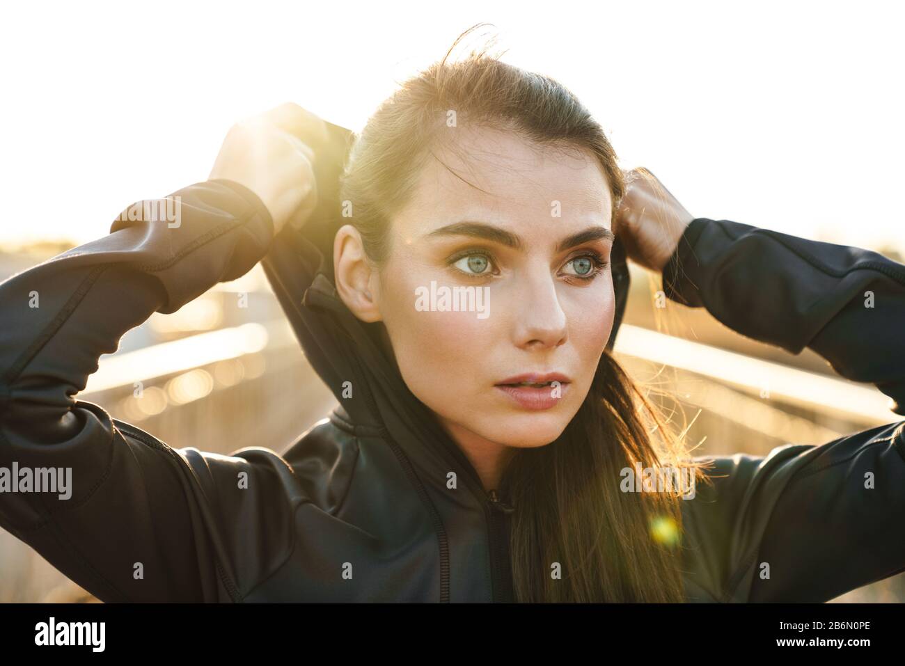 Image of a beautiful young amazing sports fitness woman posing outdoors ...
