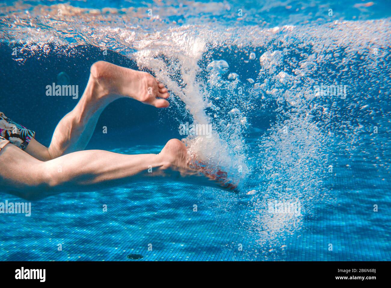 Mens legs swimming pool hi-res stock photography and images - Alamy