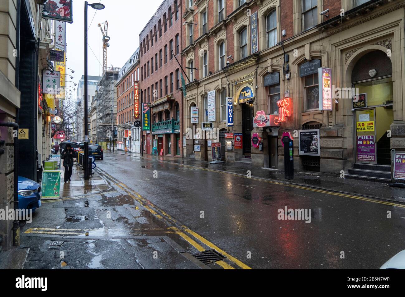 Wet empty streets in China Town, Manchester, UK. 10/03/20 Stock Photo ...
