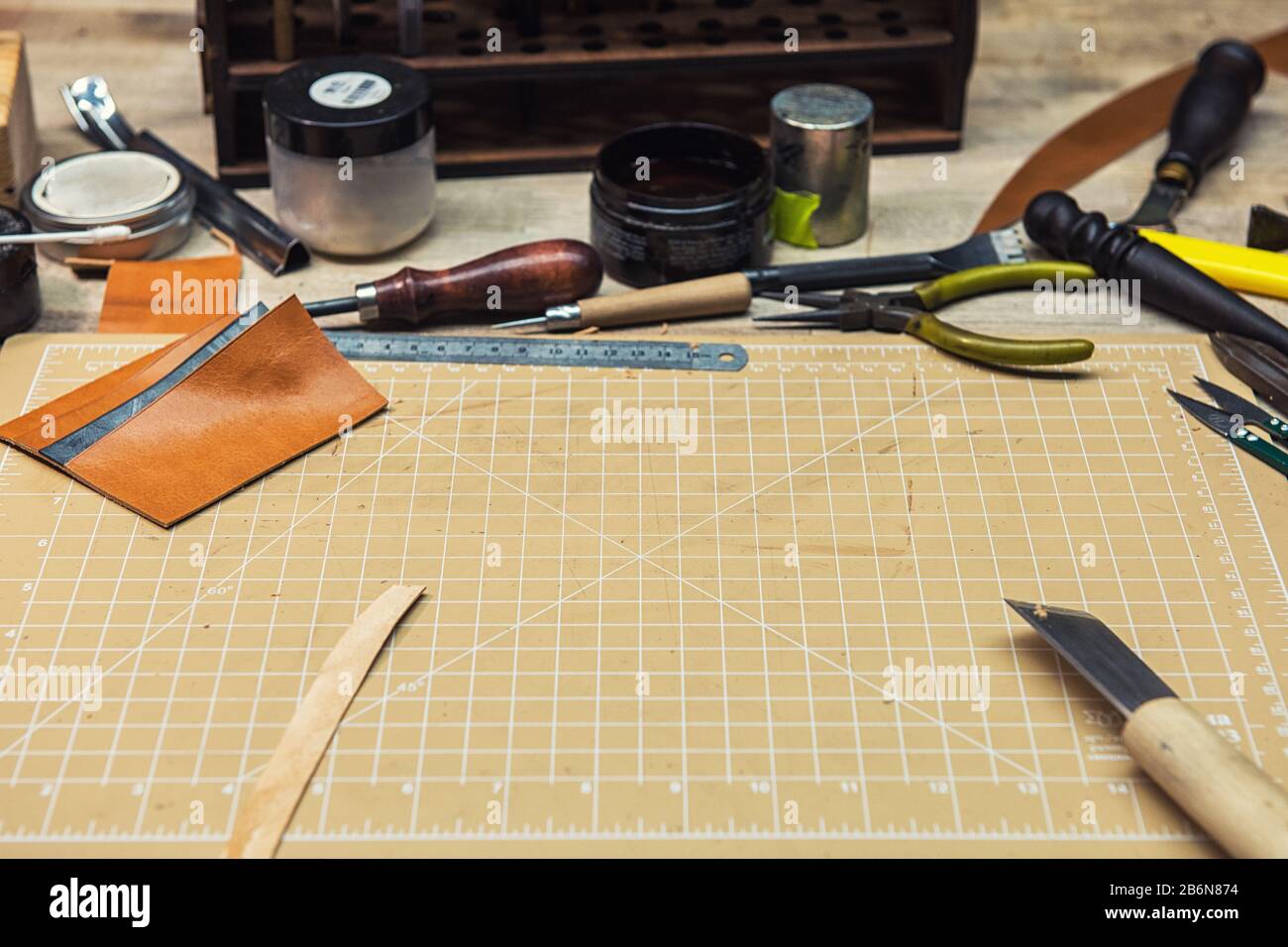 Leathermaker's work desk Stock Photo - Alamy