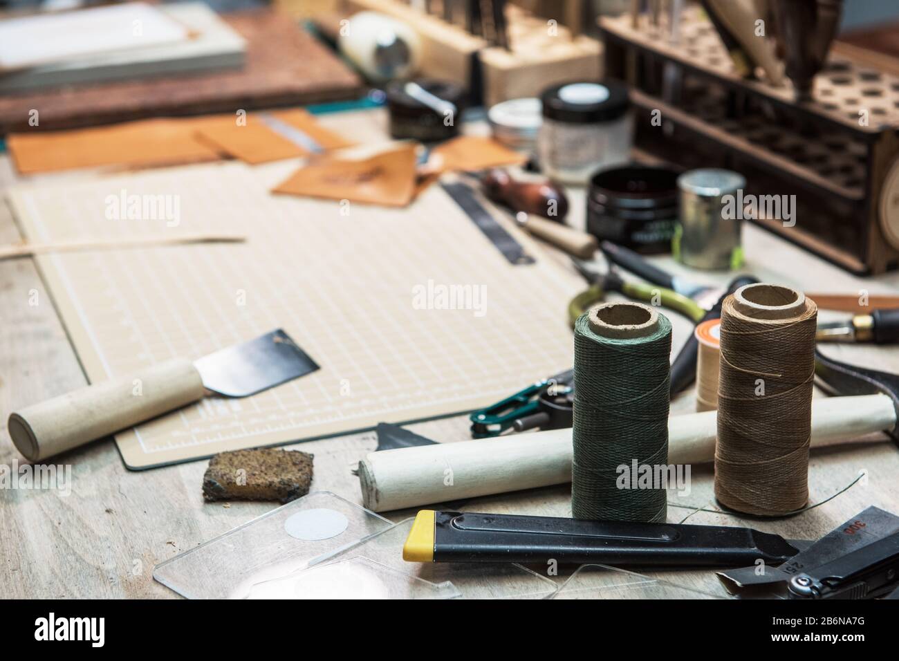 Leathermaker's work desk Stock Photo - Alamy