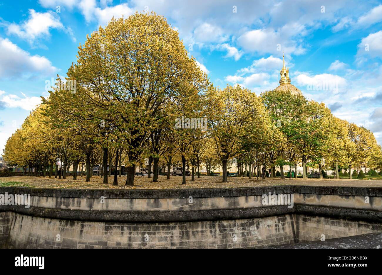 A beautiful park with colorful autumn trees near Les Invalides complex ...