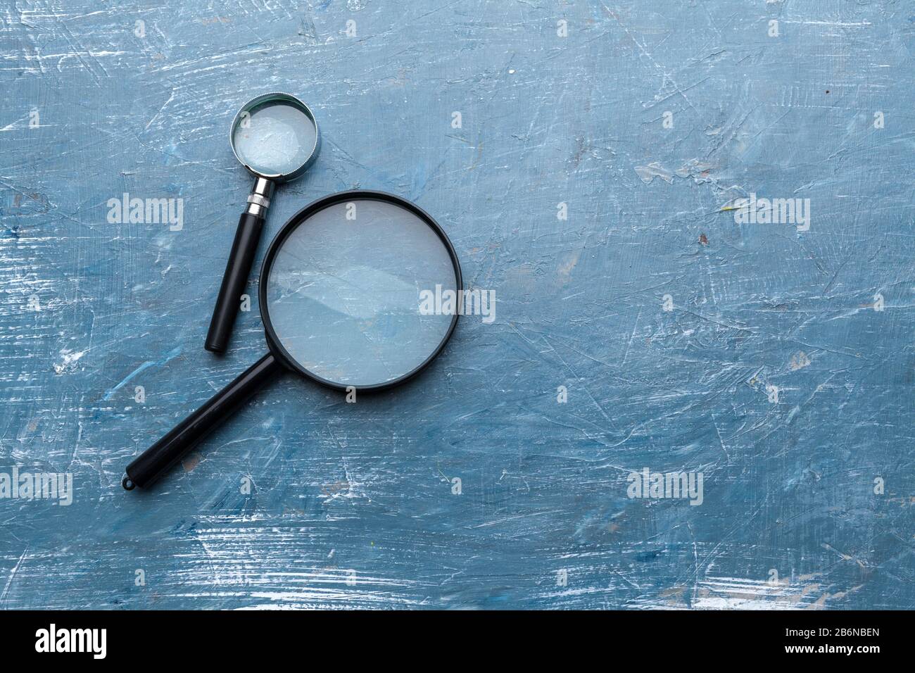Top view of modern workplace on blue table Stock Photo - Alamy