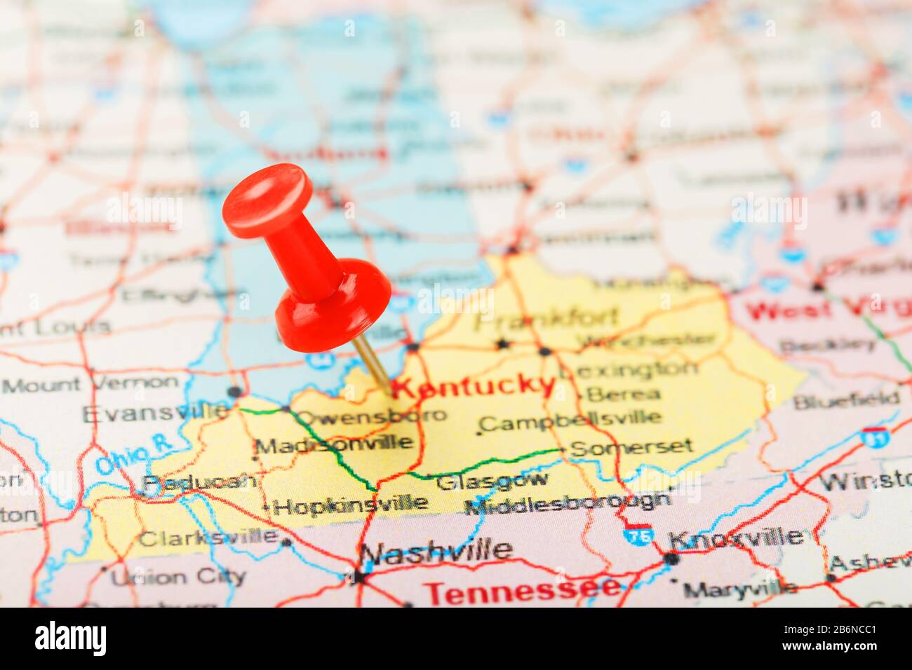 Red clerical needle on a map of USA, South Kentucky and the capital ...