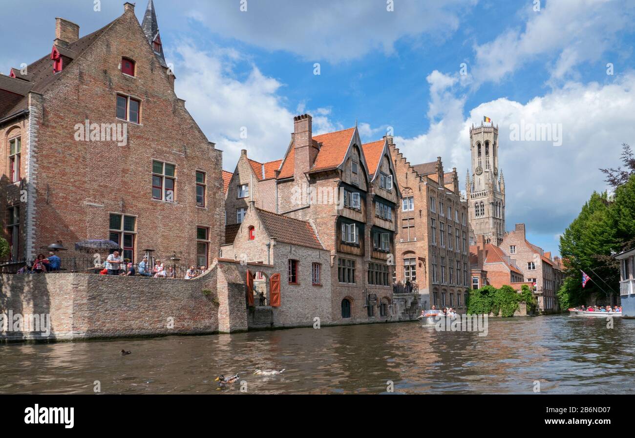 The famous canals in Bruges, Belgium. At the rear is the Brugge ...