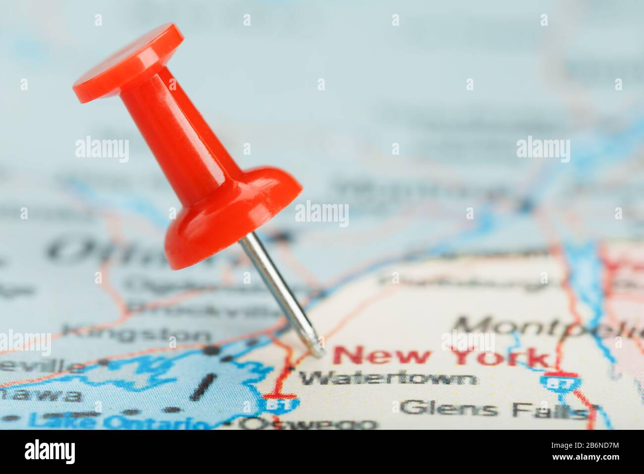 Red clerical needle on a map of USA, South New York and the capital ...