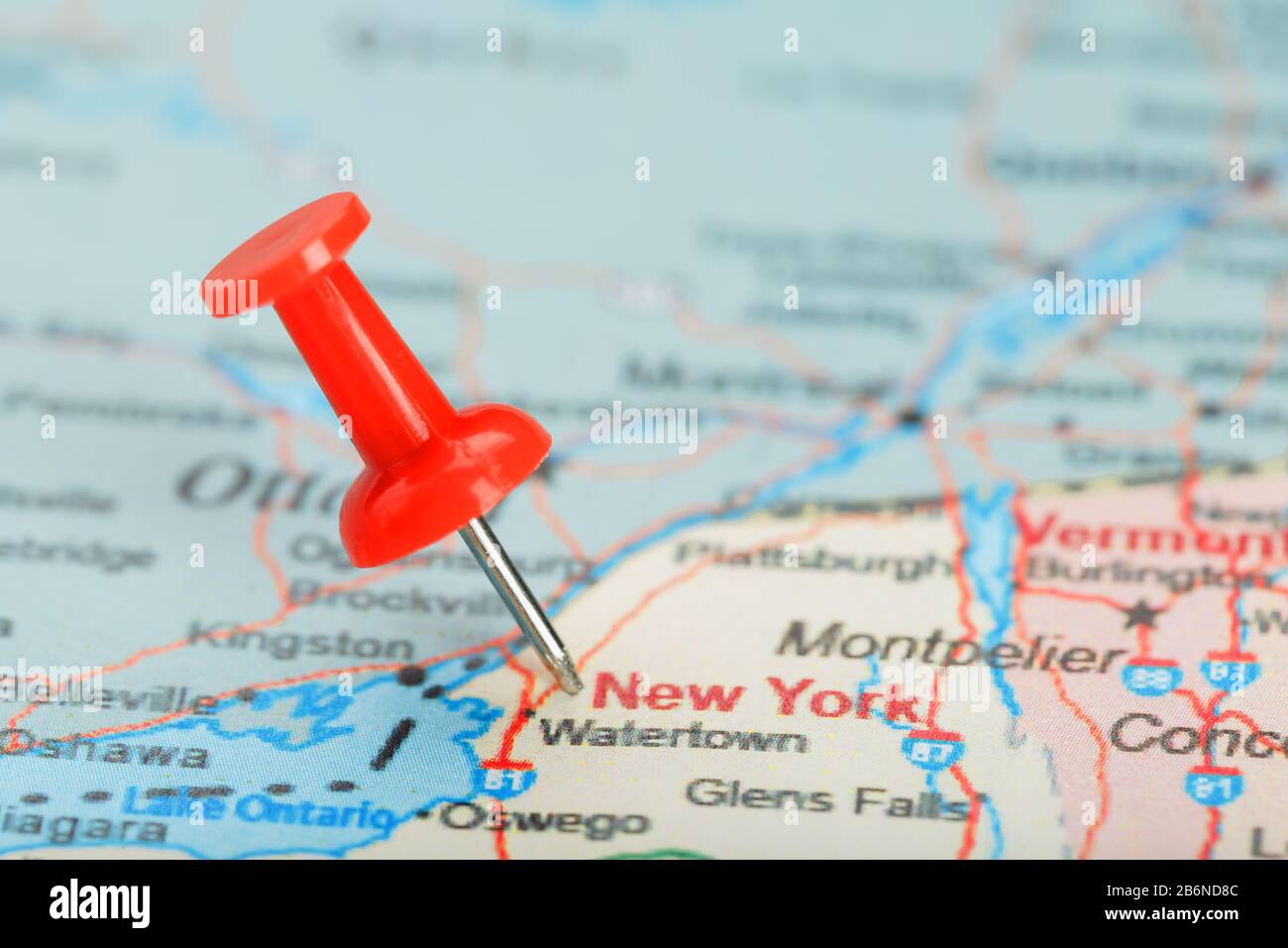 Red clerical needle on a map of USA, South New York and the capital ...