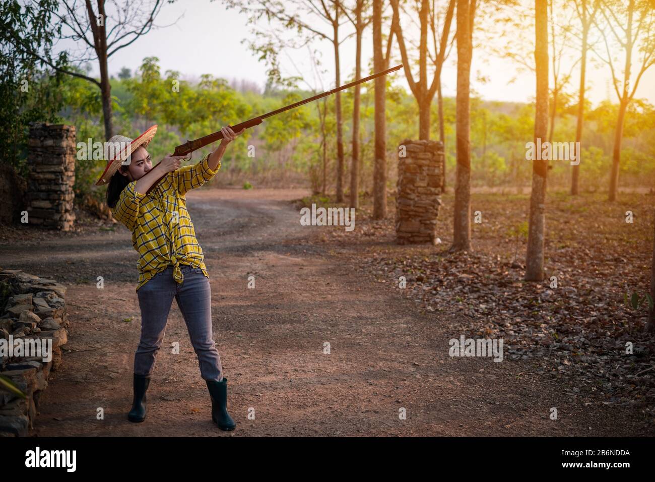 Portrait the farmer asea woman wearing a hat at the shooting range shot ...