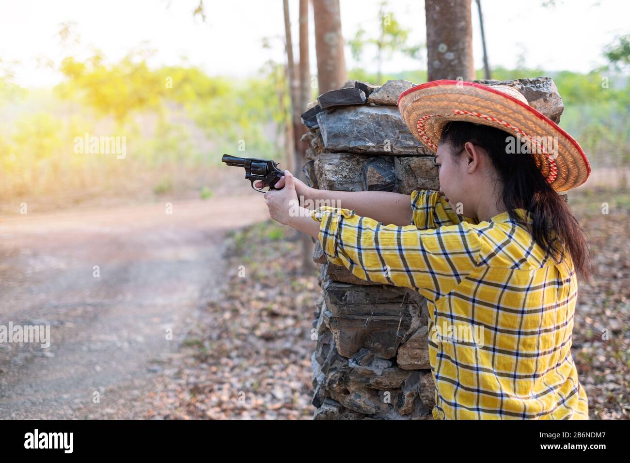 Portrait the farmer asea woman wearing a hat at the shooting shot from ...