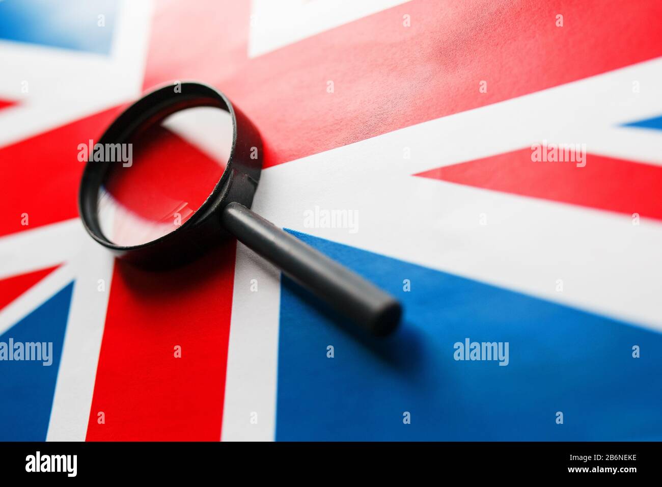 UK flag looking through a magnifying glass. The study of the history ...