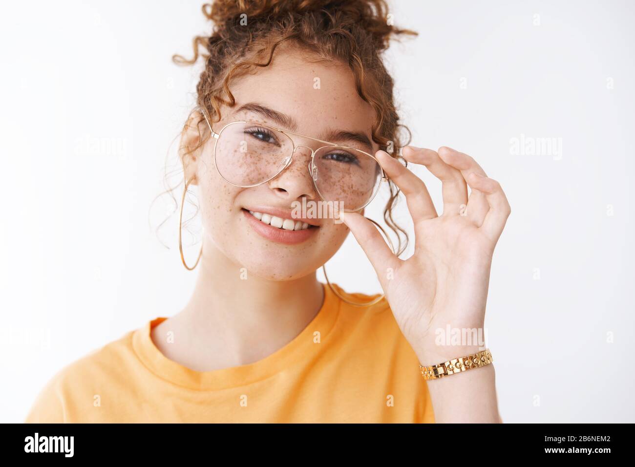 Close Up Attractive Happy Redhead Girl Freckles Messy Hairbun Touching