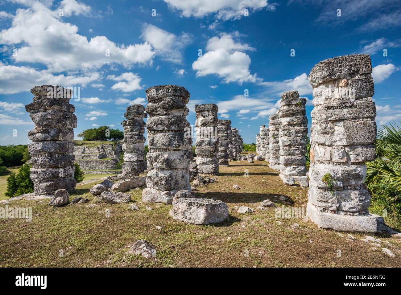 Stone columns at Edificio de las Pilastras, Maya ruins in Ake, Yucatan ...