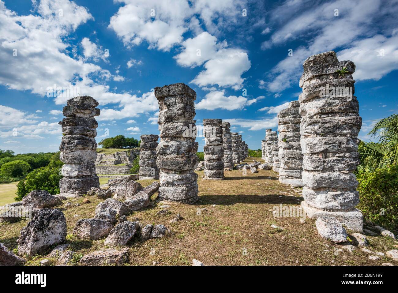 Stone columns at Edificio de las Pilastras, Maya ruins in Ake, Yucatan ...