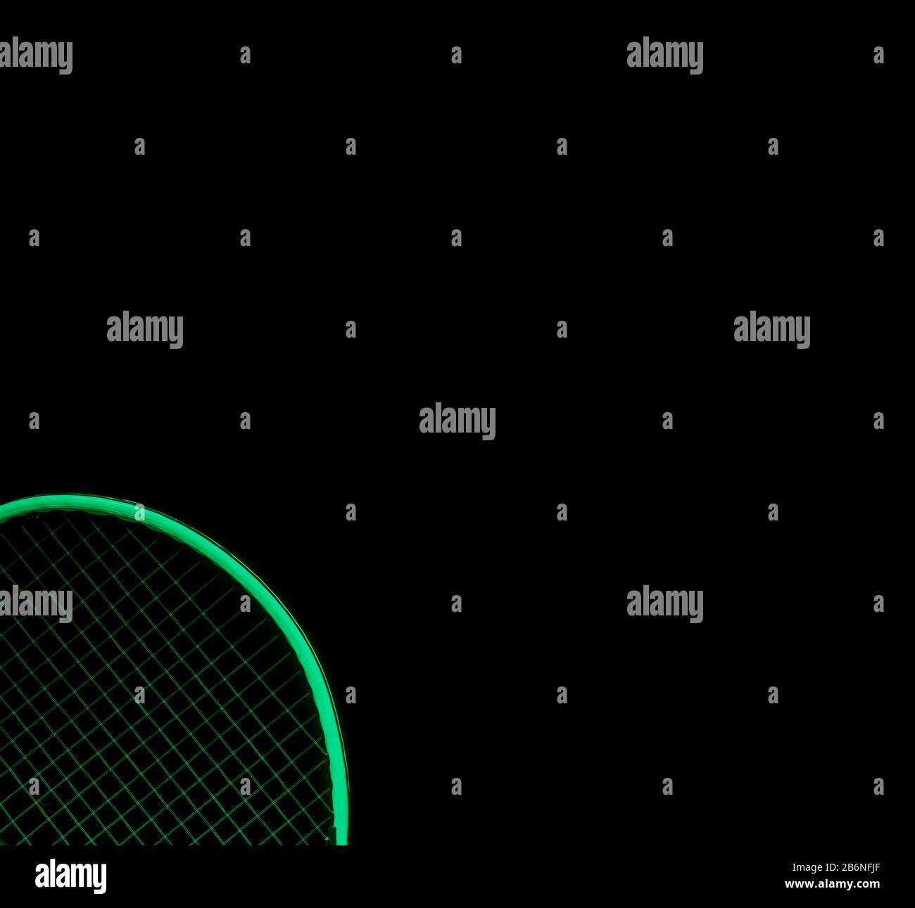 Close-up Green Tennis Racket on Black Background Stock Photo - Alamy