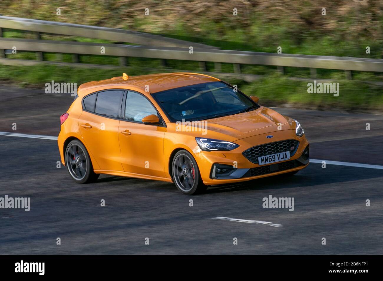 2019 orange Ford Focus ST; UK vehicular traffic, transport, modern ...