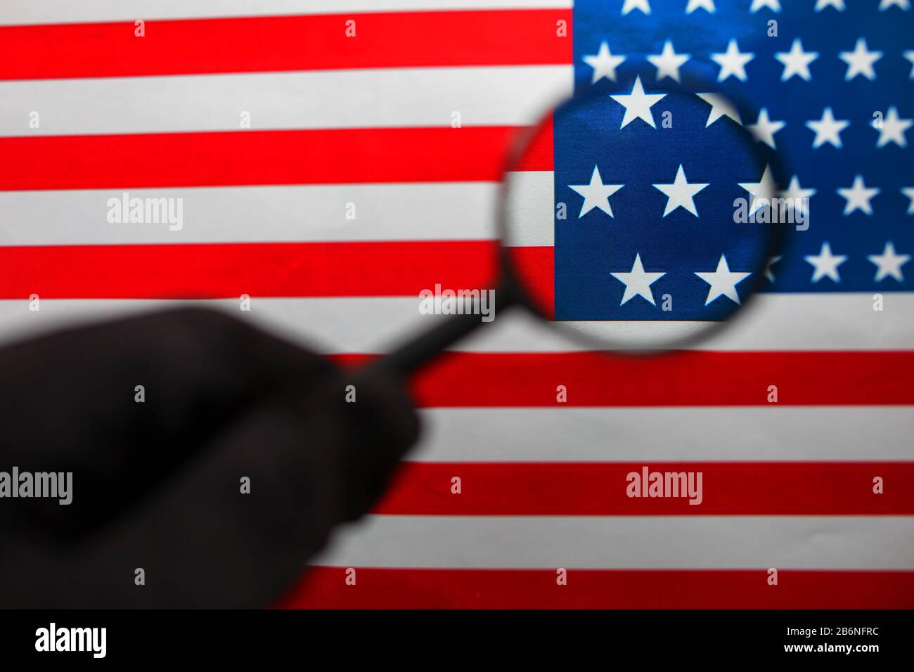 The US flag looks through a magnifying glass. Total surveillance of the ...