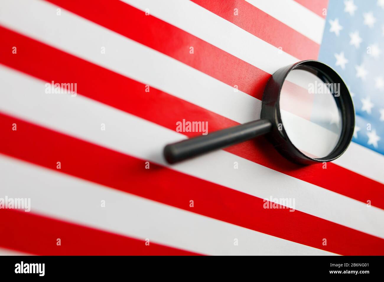 The US flag looks through a magnifying glass. Total surveillance of the ...