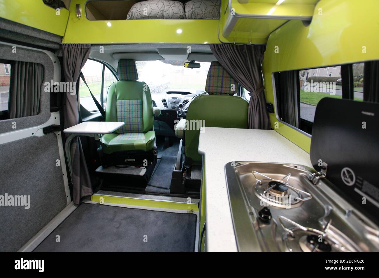 Interior of bright modern campervan conversion Stock Photo - Alamy