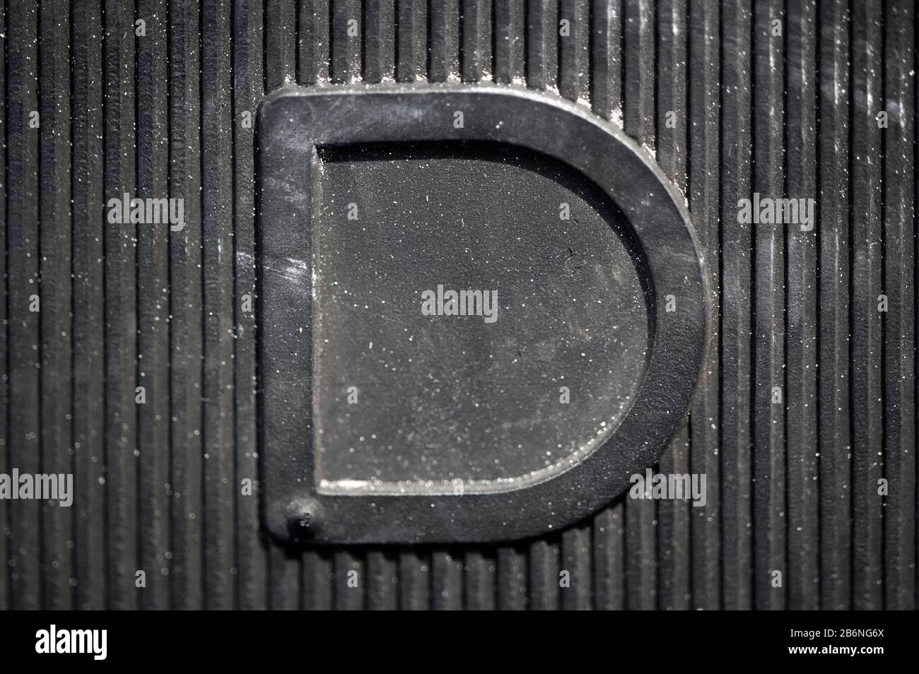 detail of the letter "D" engraved on a wheel of a vehicle Stock Photo ...