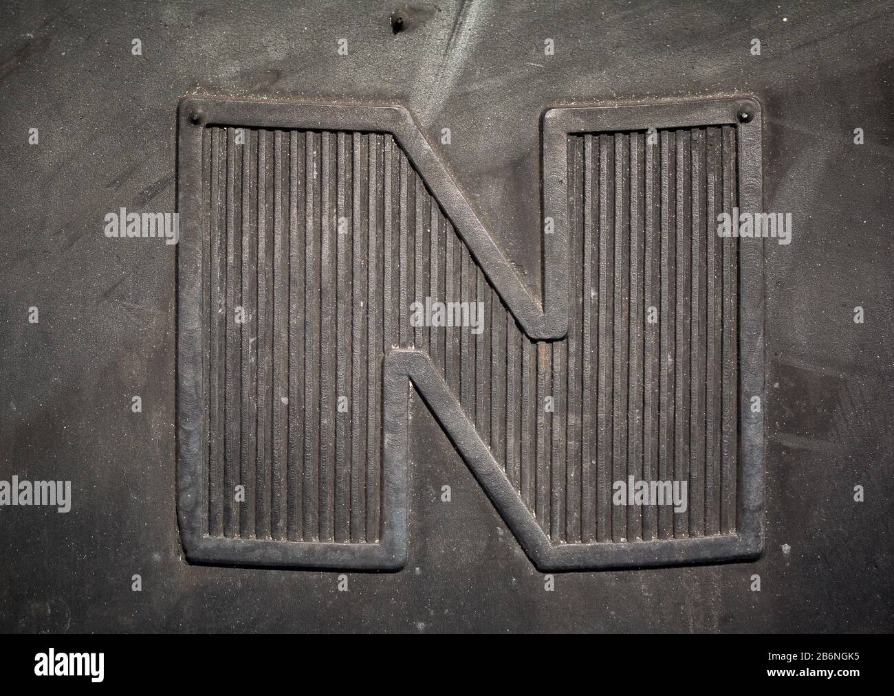 detail of the letter "N" engraved on a wheel of a vehicle Stock Photo ...