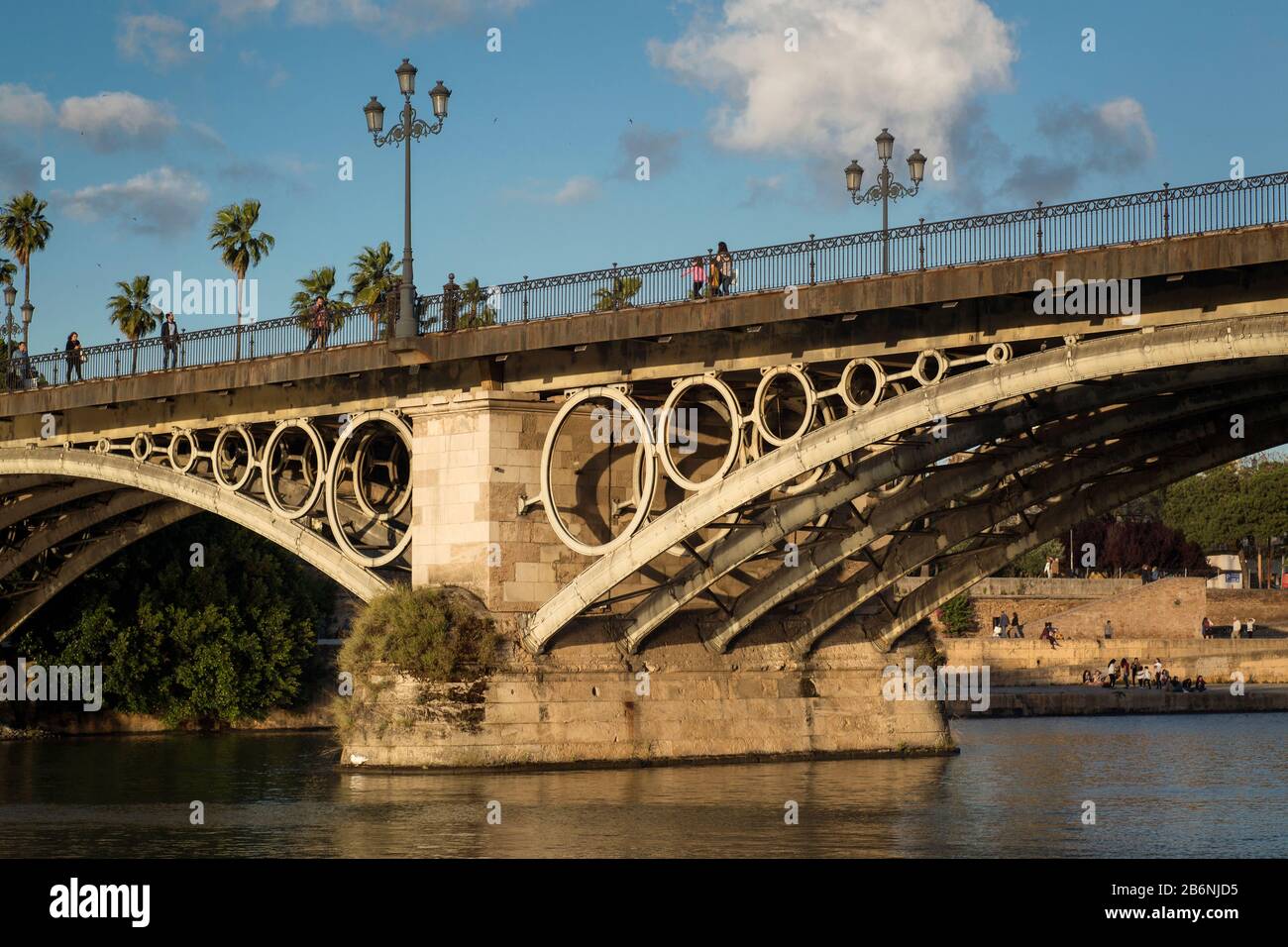 Lateral view of Triana Bridge, Seville’s oldest bridge, over the ...