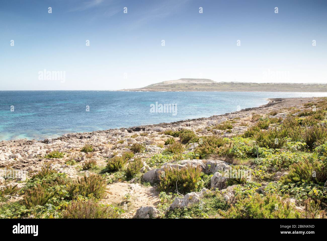 stoney beach in malta looking down the coastline at Maghtab known for ...