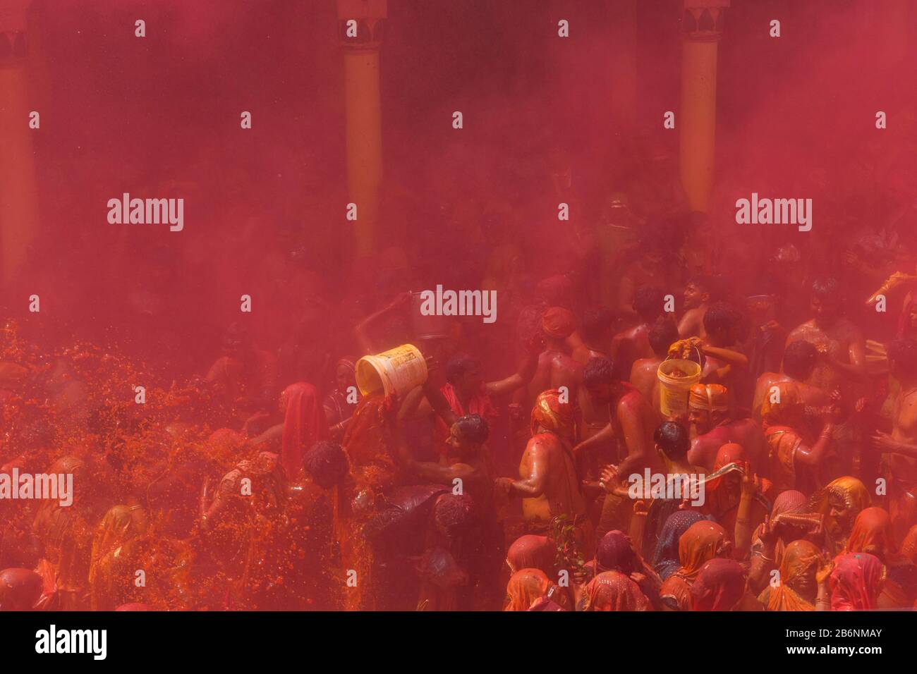 Baldeo, near Mathura, India. 11 March 2020. People celebrating the end ...