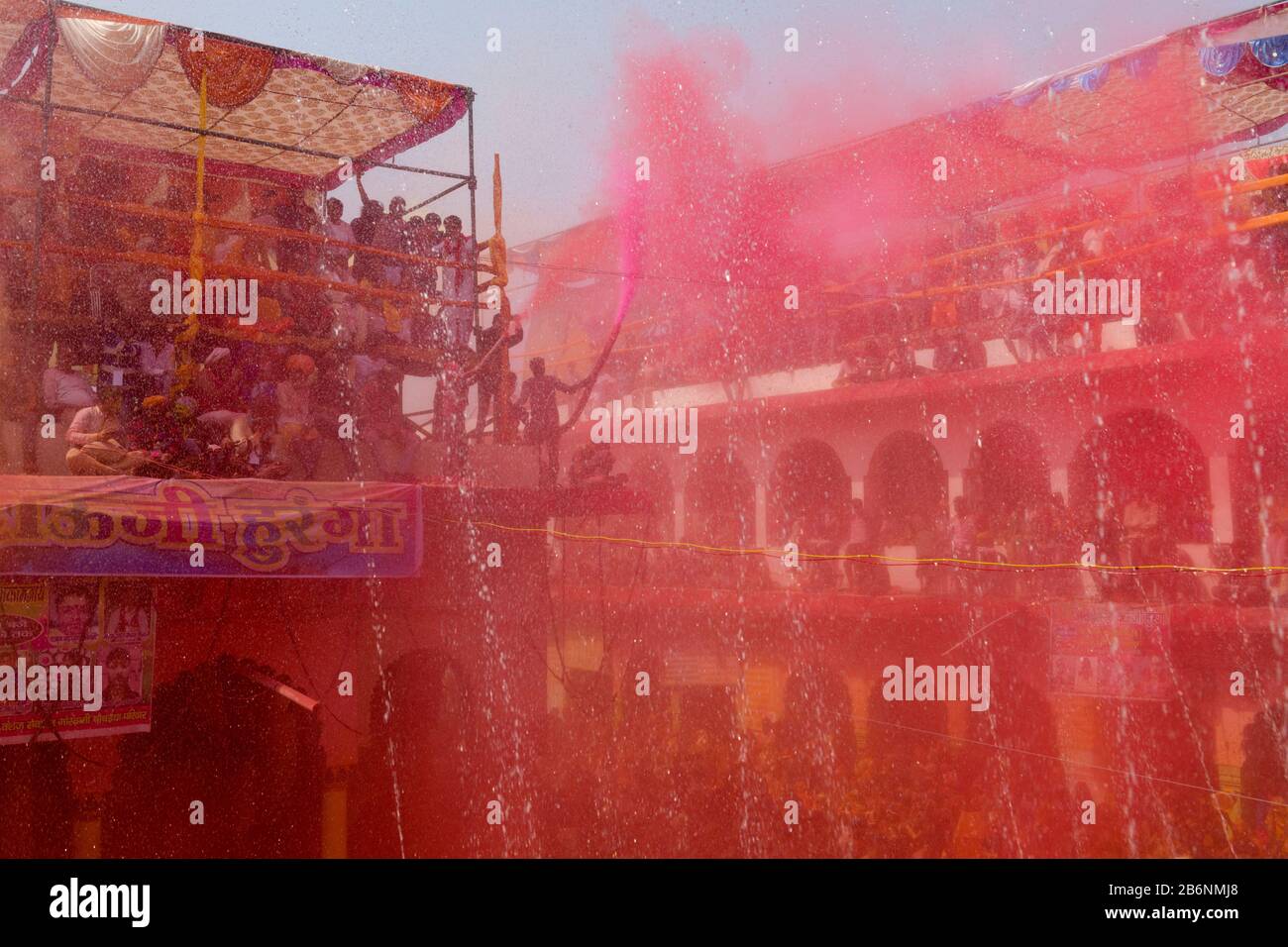 Baldeo, near Mathura, India. 11 March 2020. People celebrating the end ...