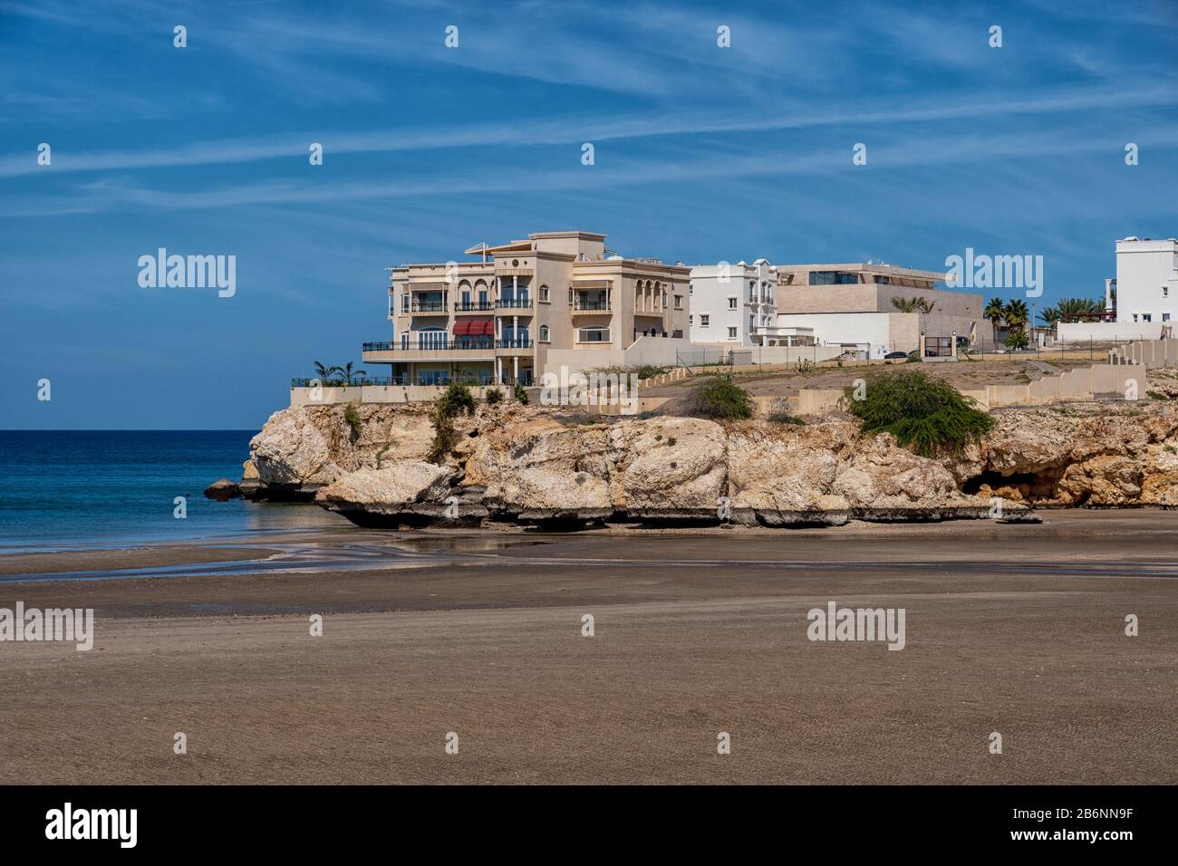 Beach and cliffs in Muscat in Oman Stock Photo - Alamy