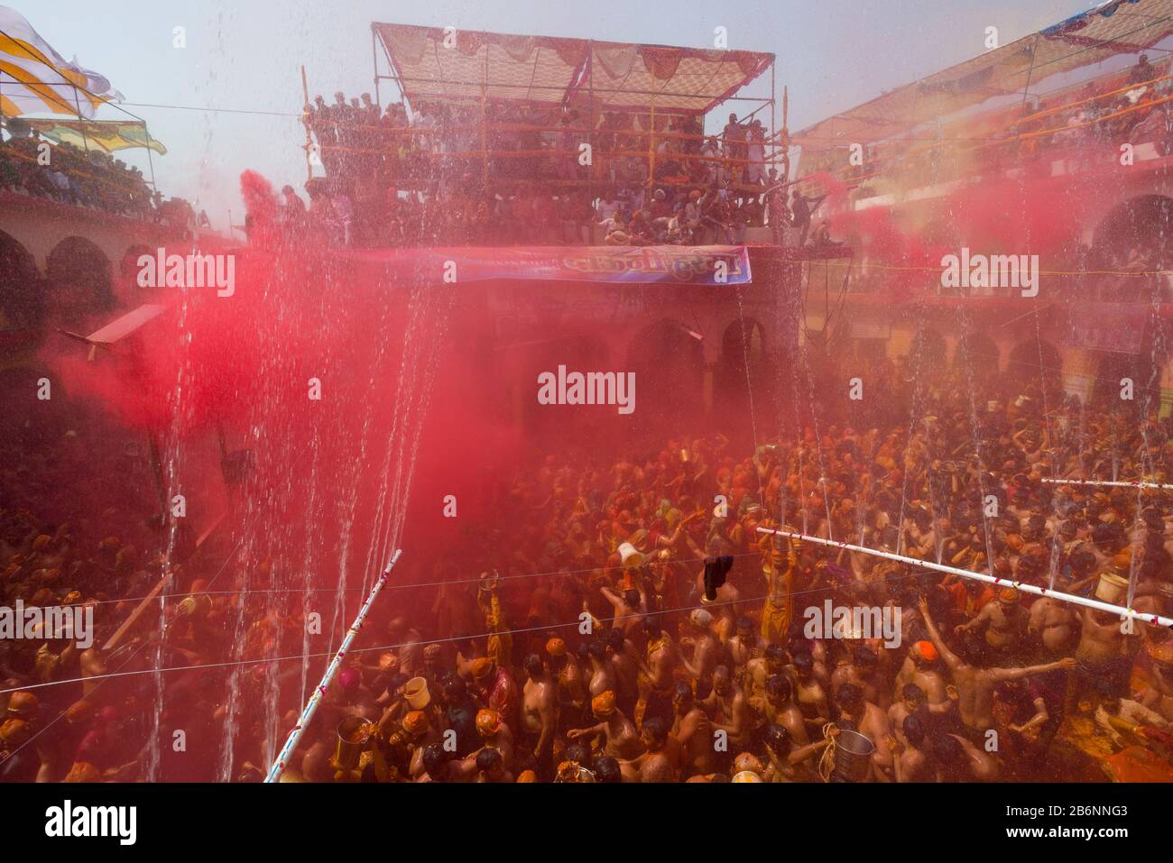 Baldeo, near Mathura, India. 11 March 2020. People celebrating the end ...