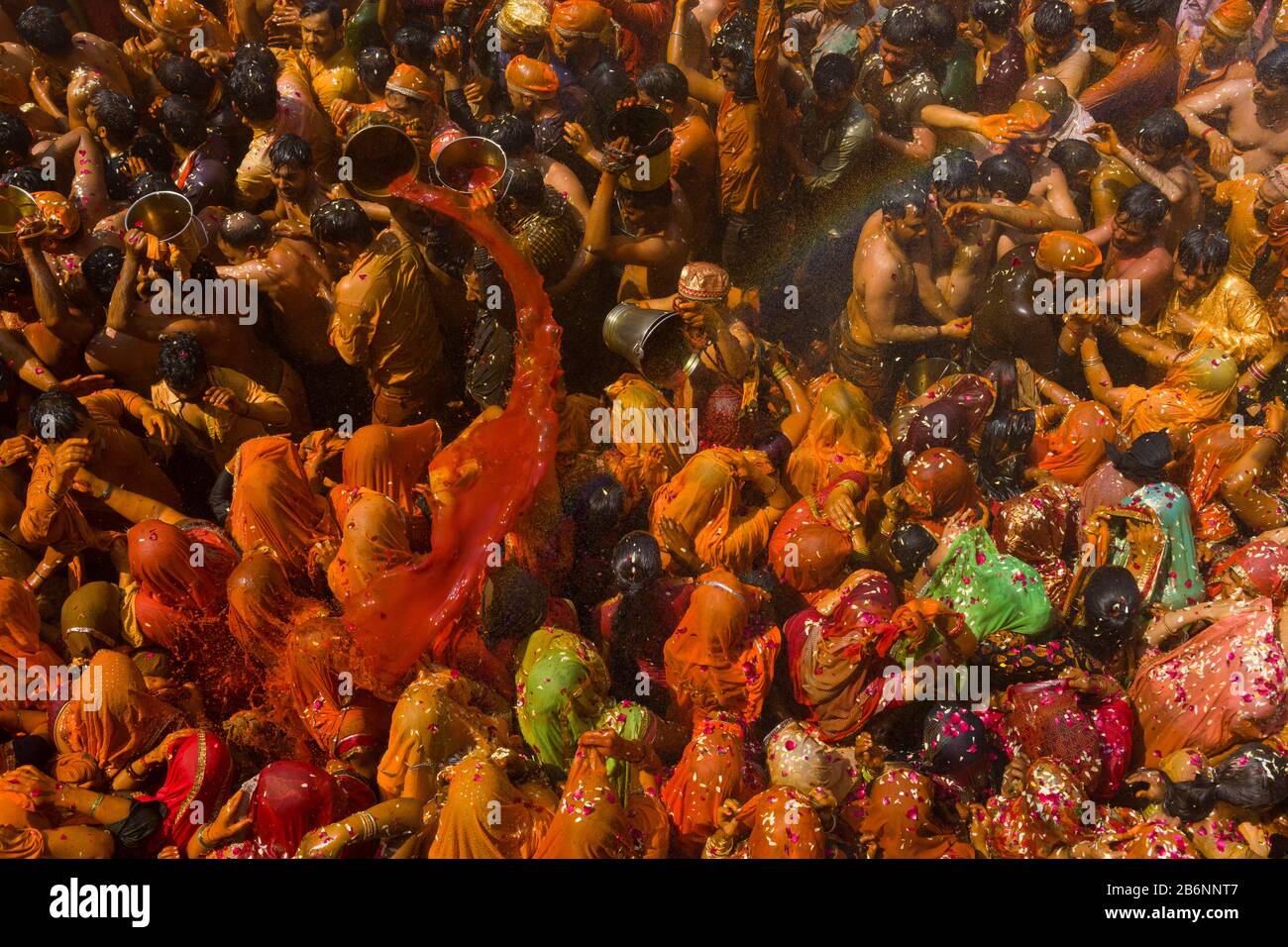 Baldeo, near Mathura, India. 11 March 2020. People celebrating the end ...