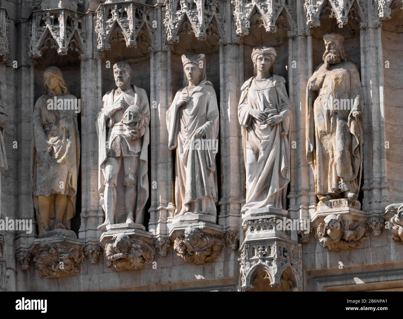 Stone statues decorate the Medieval Town Hall / Hotel De Ville Stadhuis ...