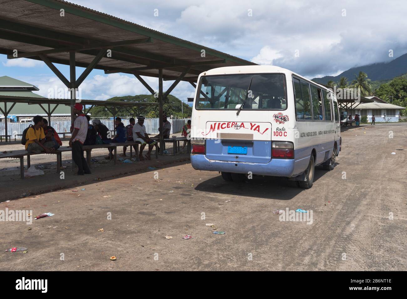 dh PNG Bus station ALOTAU PAPUA NEW GUINEA Local people waiting for ...