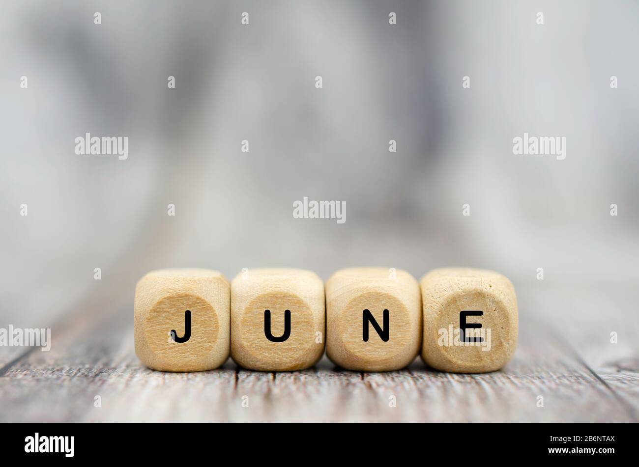 The word June on wooden cubes. Month of year Stock Photo - Alamy