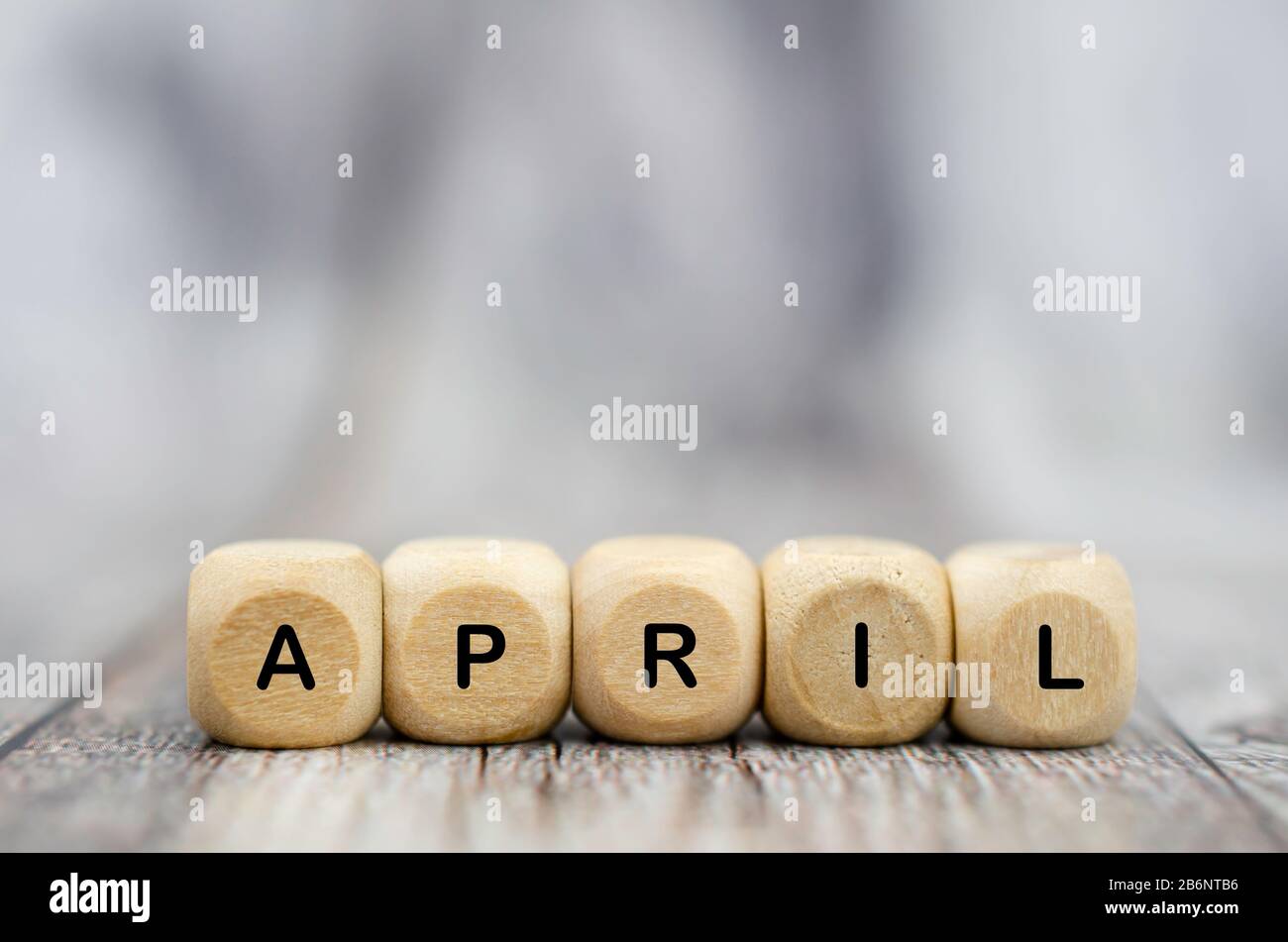 The word April on wooden cubes. Month of year Stock Photo - Alamy