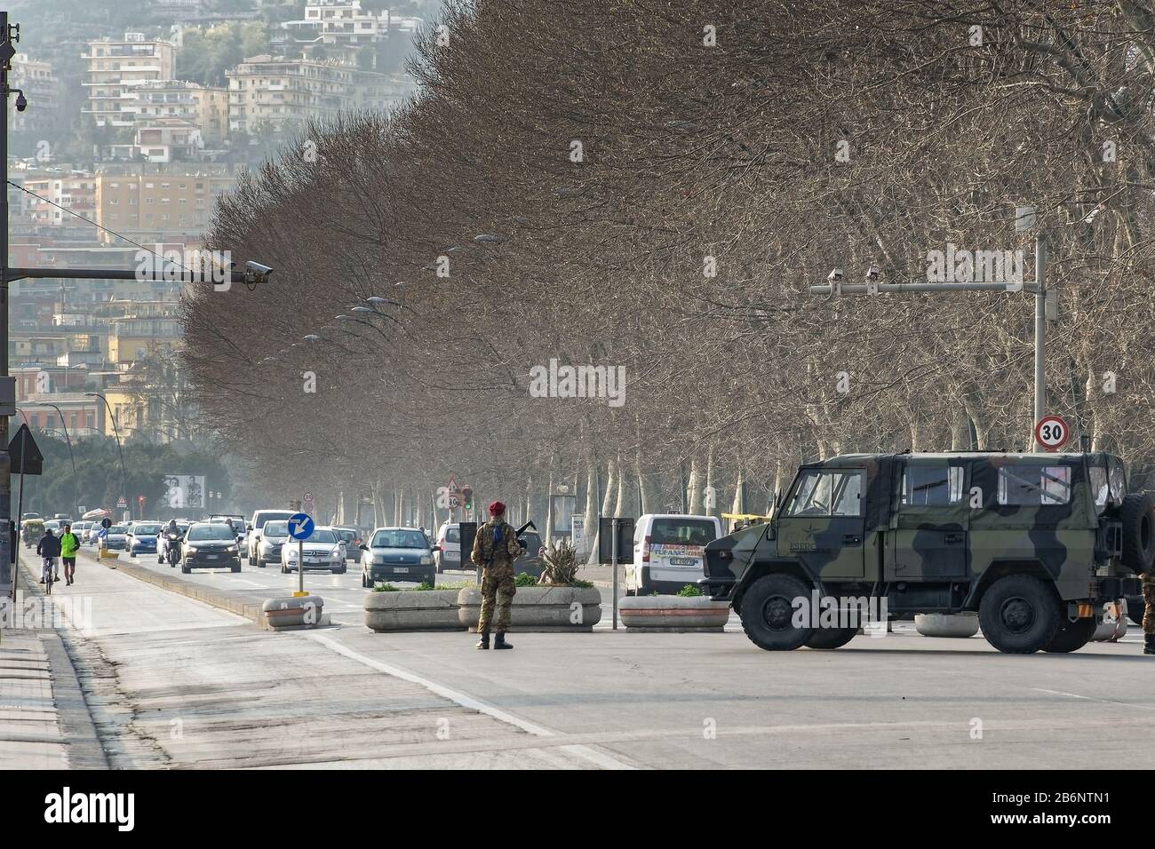 Army vehicle with military personnel at tourist site. Esercito Italian ...