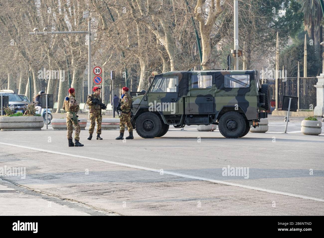 Army vehicle with military personnel at tourist site. Esercito Italian ...