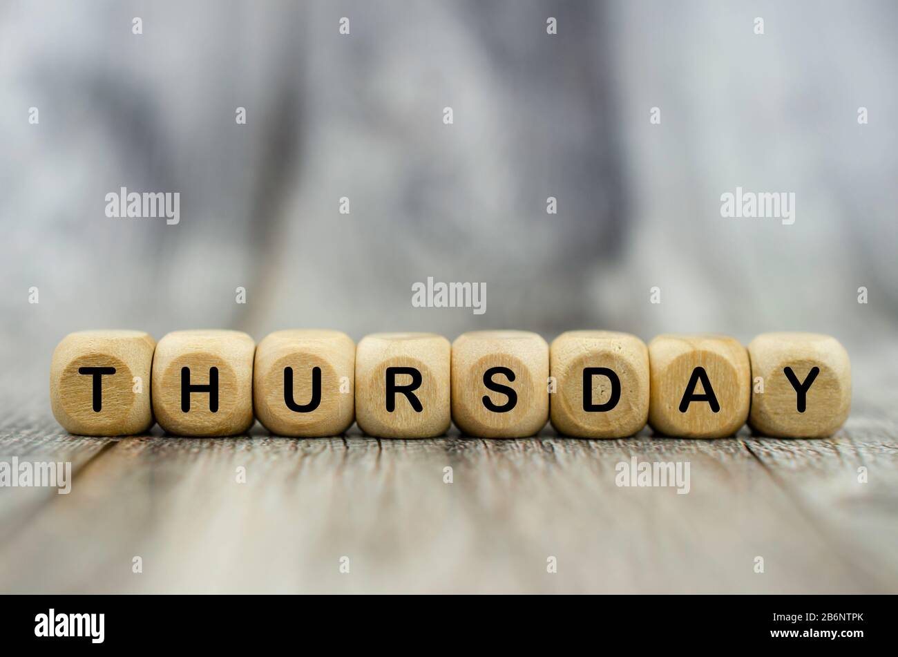 The word Thursday on wooden cubes. Weekday concept Stock Photo - Alamy