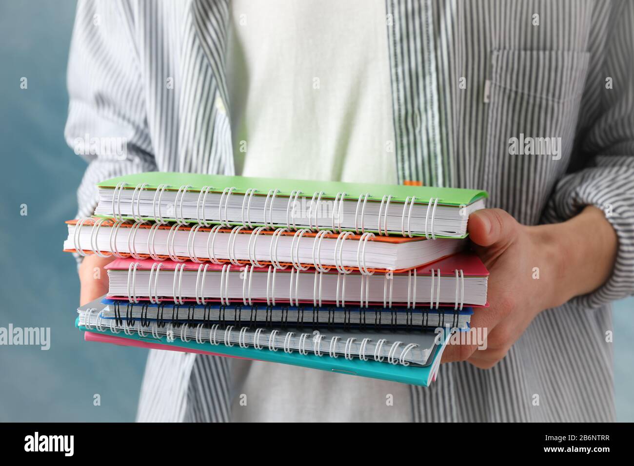 Hold copybooks hi-res stock photography and images - Alamy