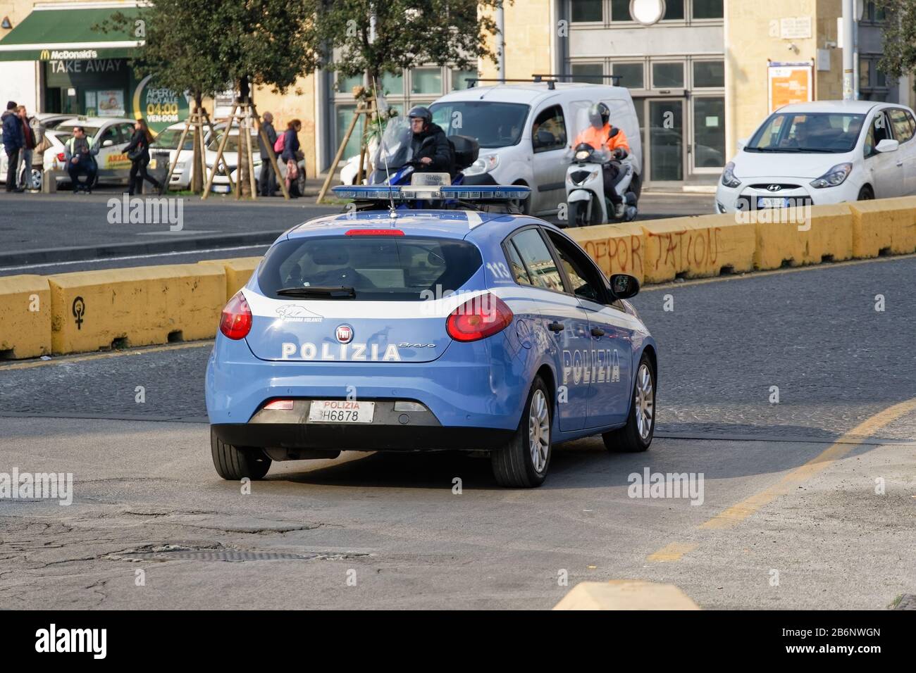 Polizia car on a city road in italy napoli hi-res stock photography and ...