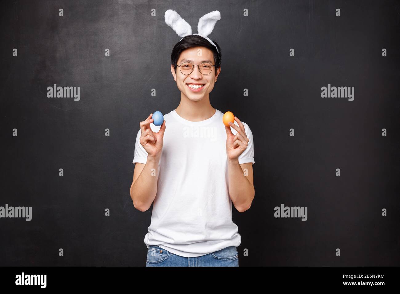 Holidays, party and Easter concept. Portrait of happy smiling friendly ...