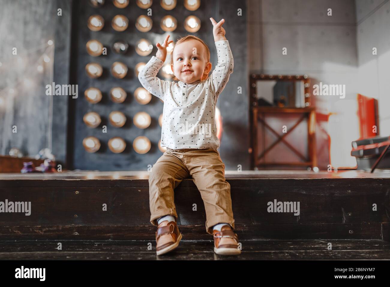 Little pretty funny kid posing at studio Stock Photo - Alamy