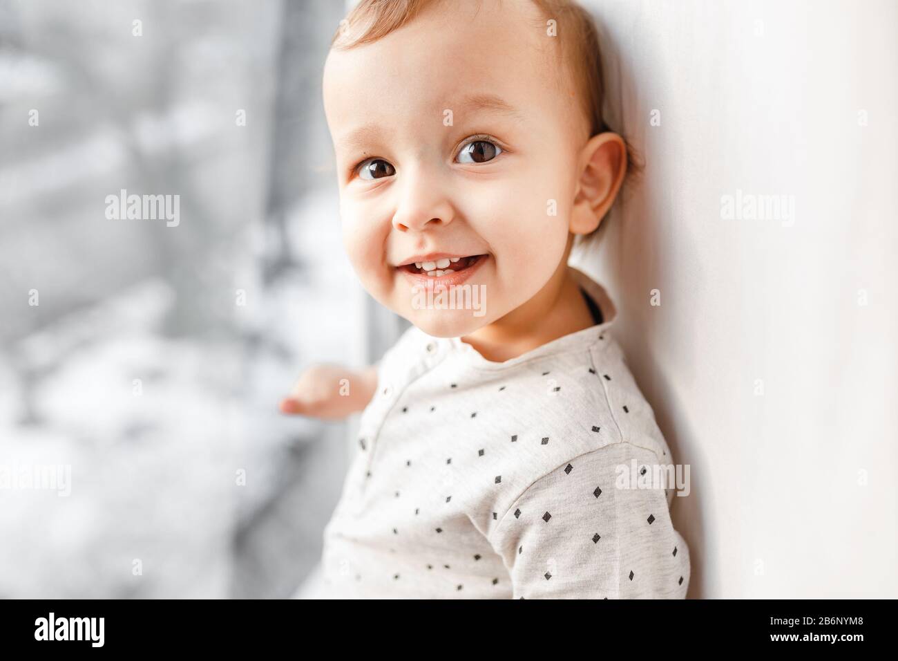 Little pretty funny kid posing at studio Stock Photo - Alamy