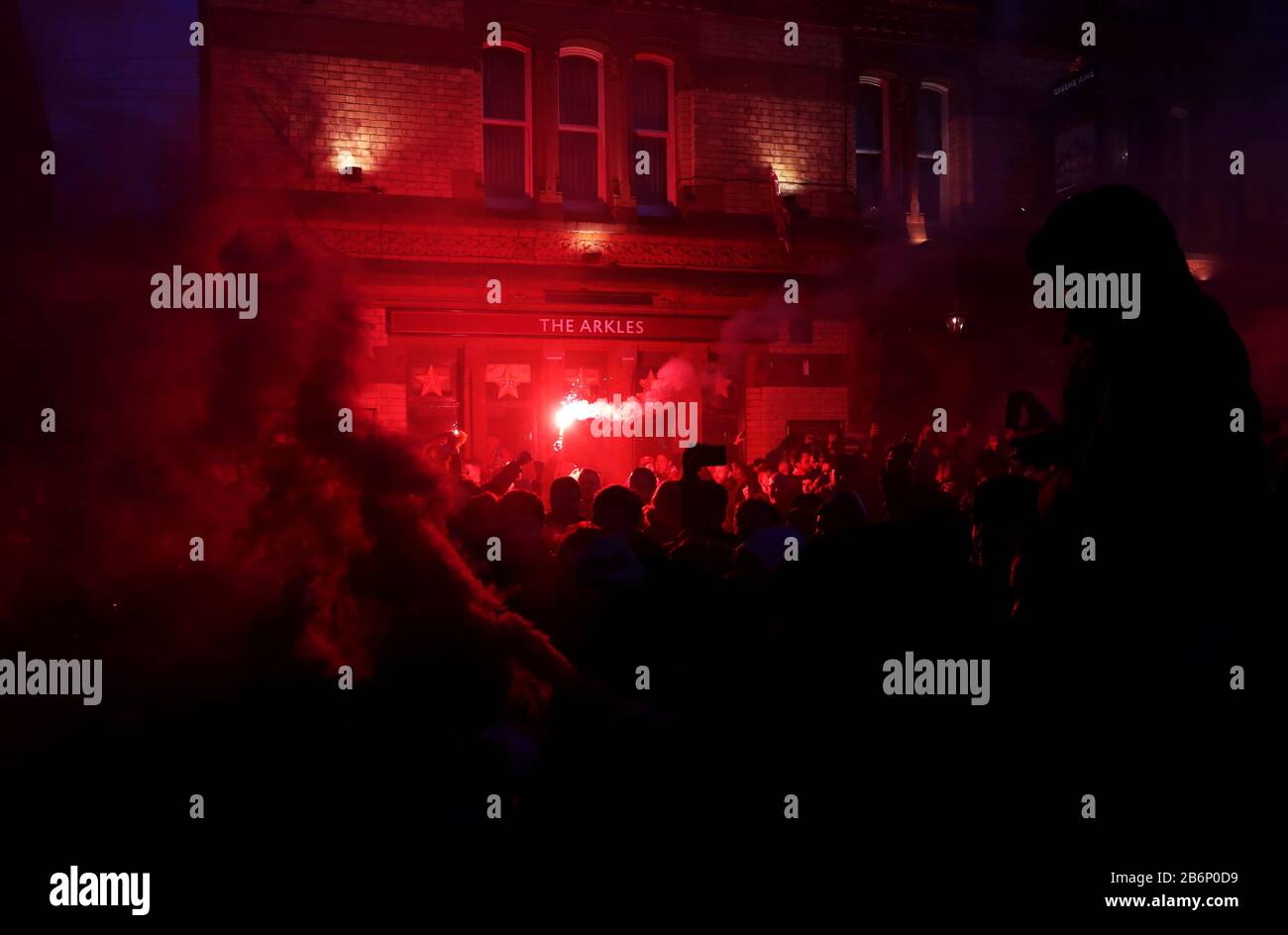 Fans let off flares outside The Arkles pub in Liverpool ahead of the ...