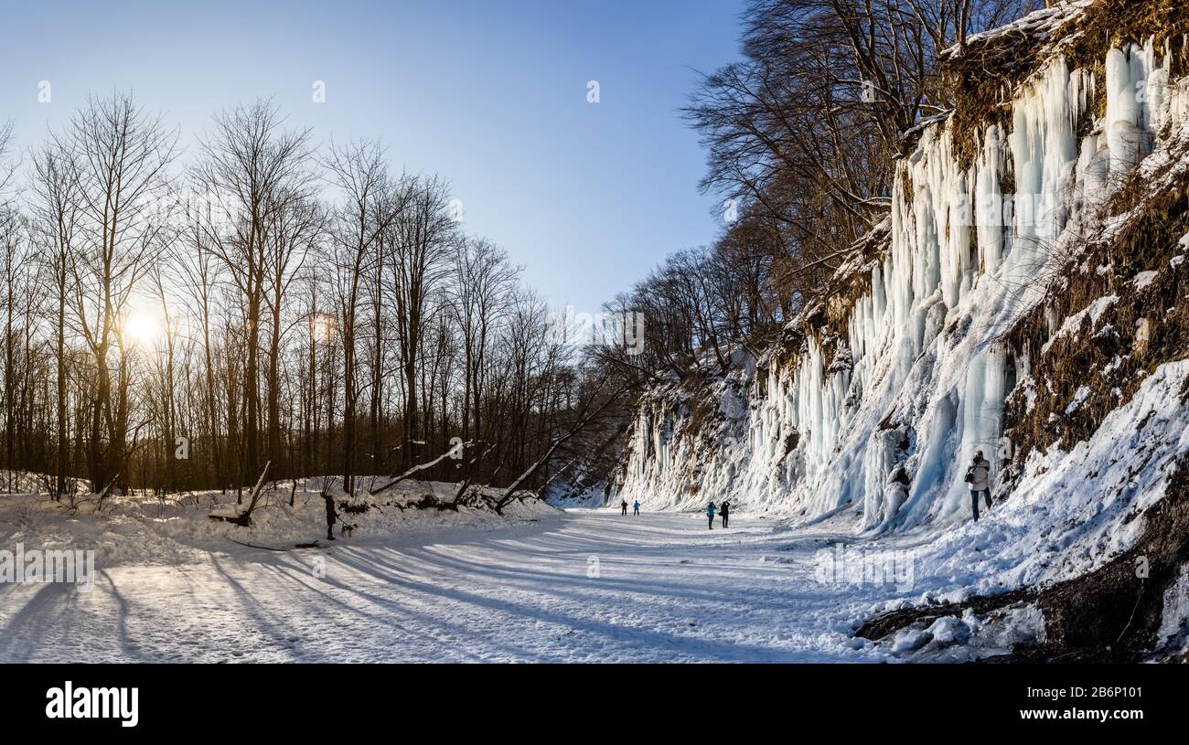 Frozen river in winter landscape sunset Stock Photo - Alamy