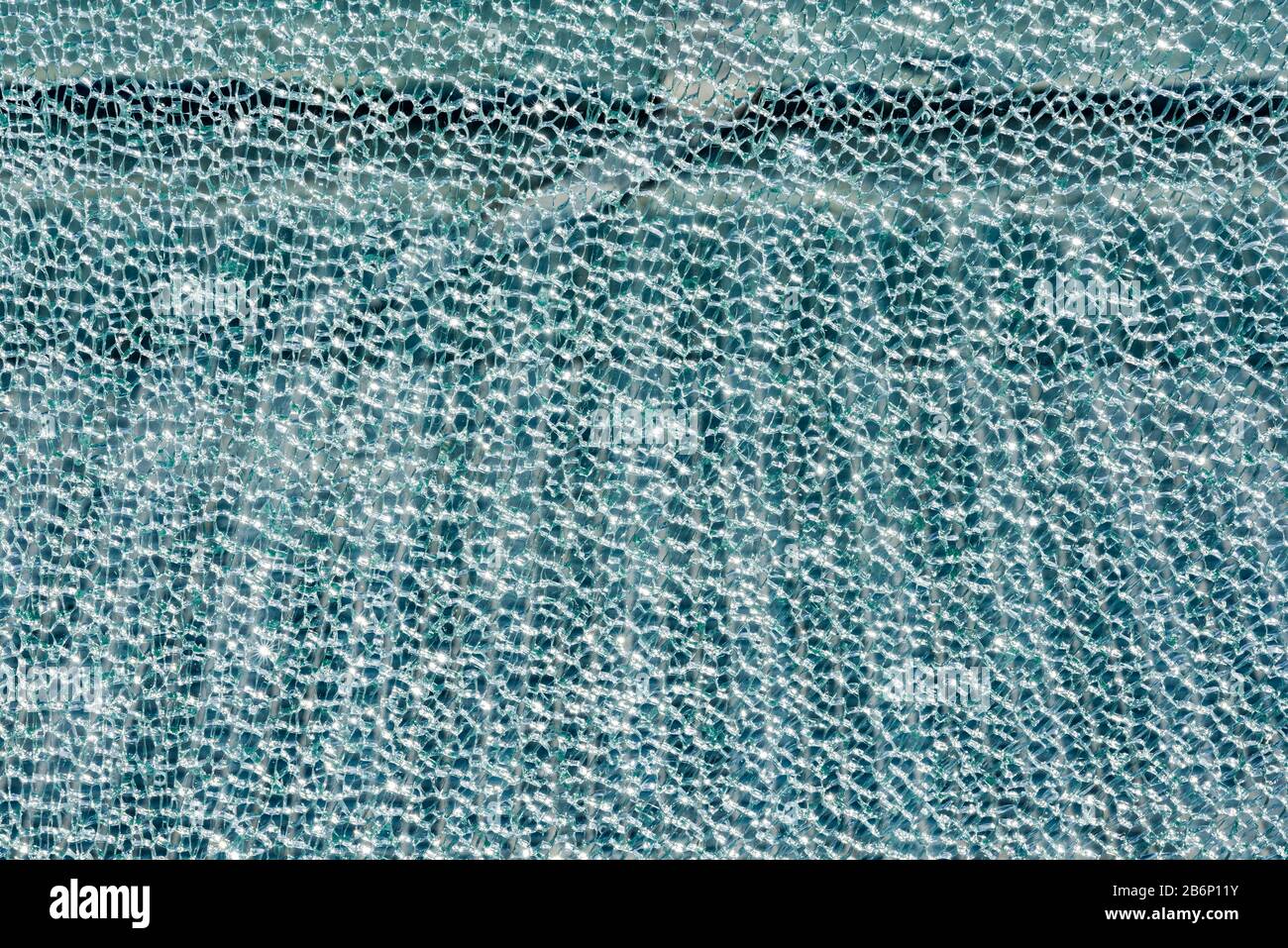 green broken glass pane background Stock Photo - Alamy
