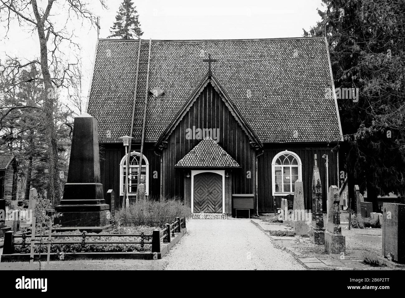 Sammatti Church in black and white, old photo style. The red wooden ...