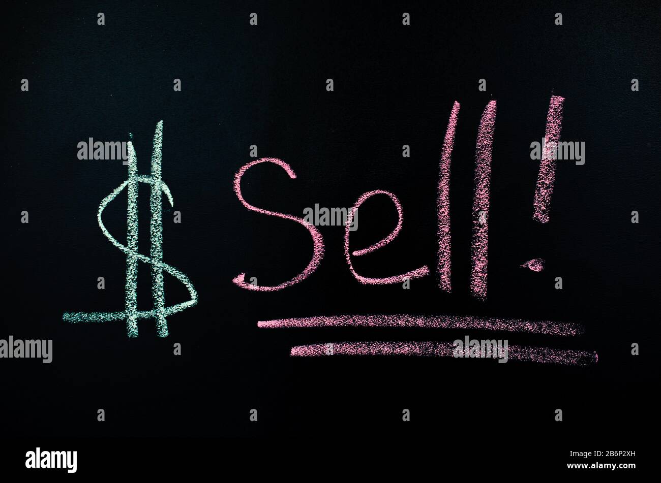 Negative chart in the red zone on the chalkboard. SELL inscription ...