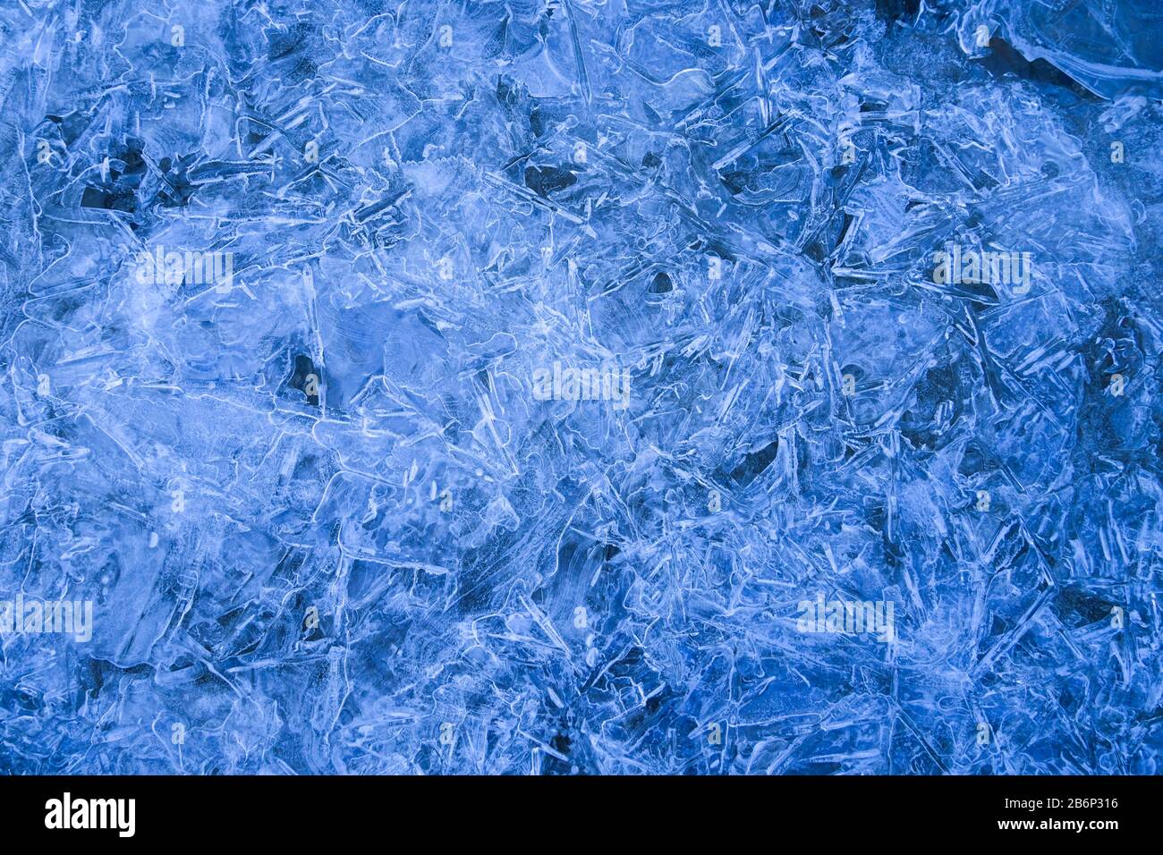 Bluish icy water on stream Stock Photo - Alamy