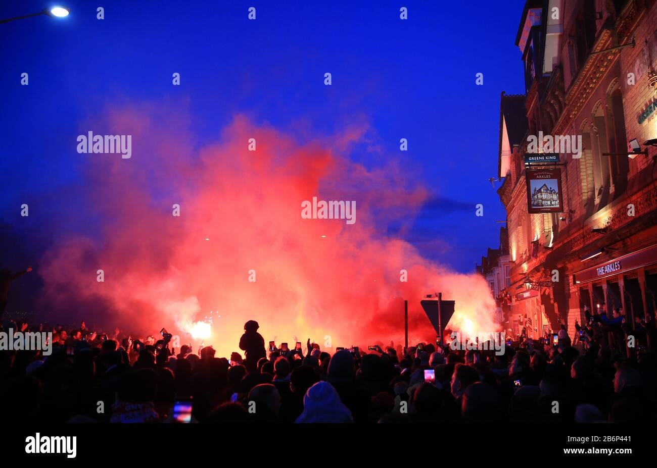 Red smoke flares hi-res stock photography and images - Alamy